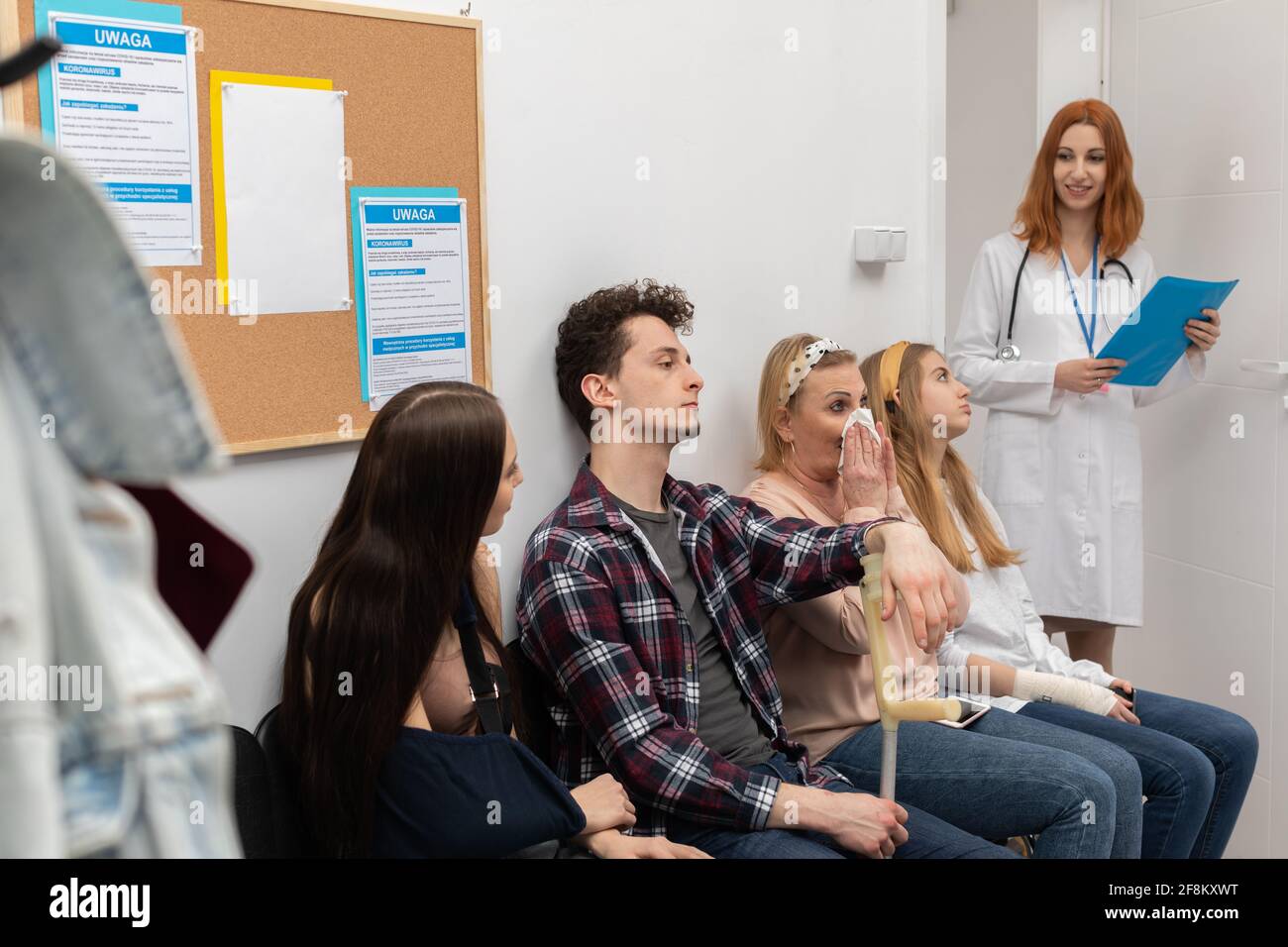 The doctor leaves the doctor's office and according to the list asks the next patient from the ...