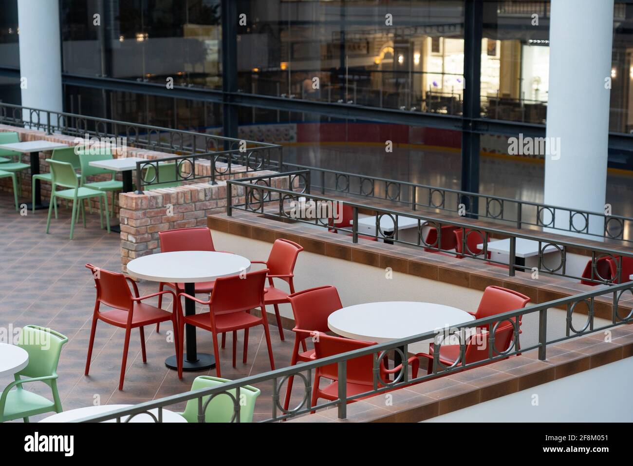 Interior of wooden table in food court shopping mall. Food center in ...
