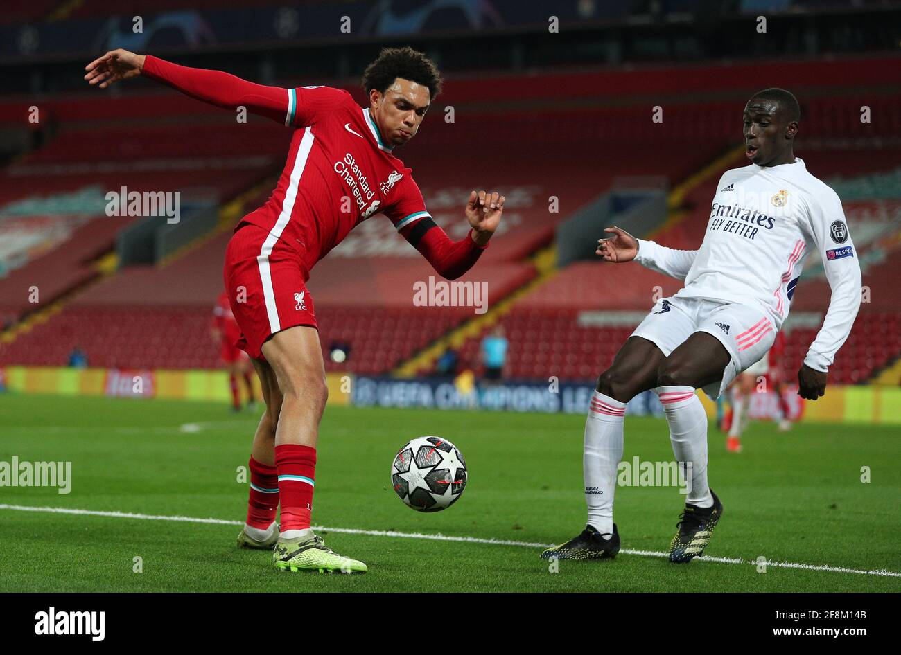 Liverpool's Trent Alexander-Arnold (left) and Real Madrid's Ferland ...