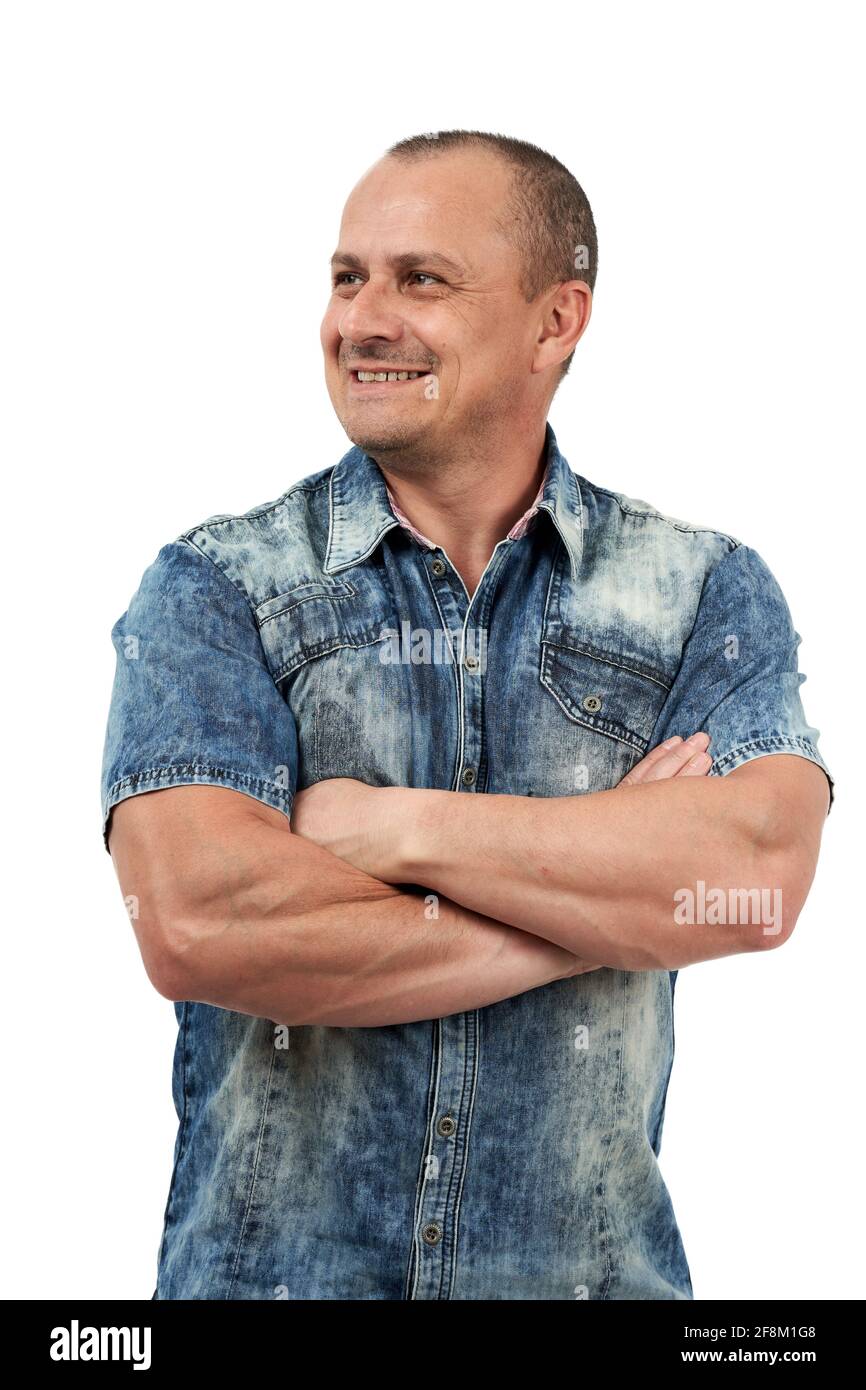 Serious muscular man arms folded hi-res stock photography and images ...