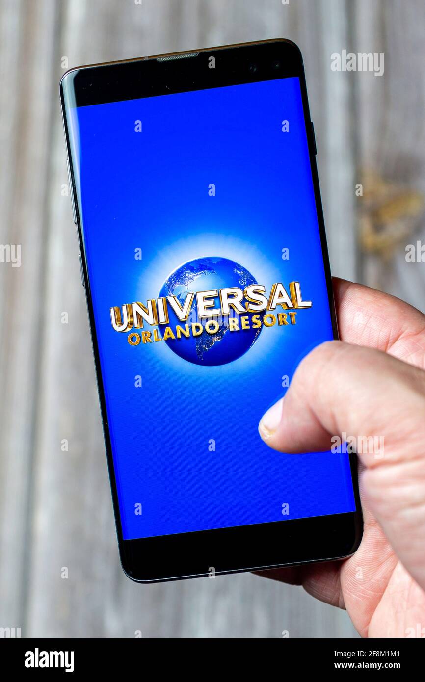 A Mobile phone or Cell phone being held in a hand showing the Universal ...