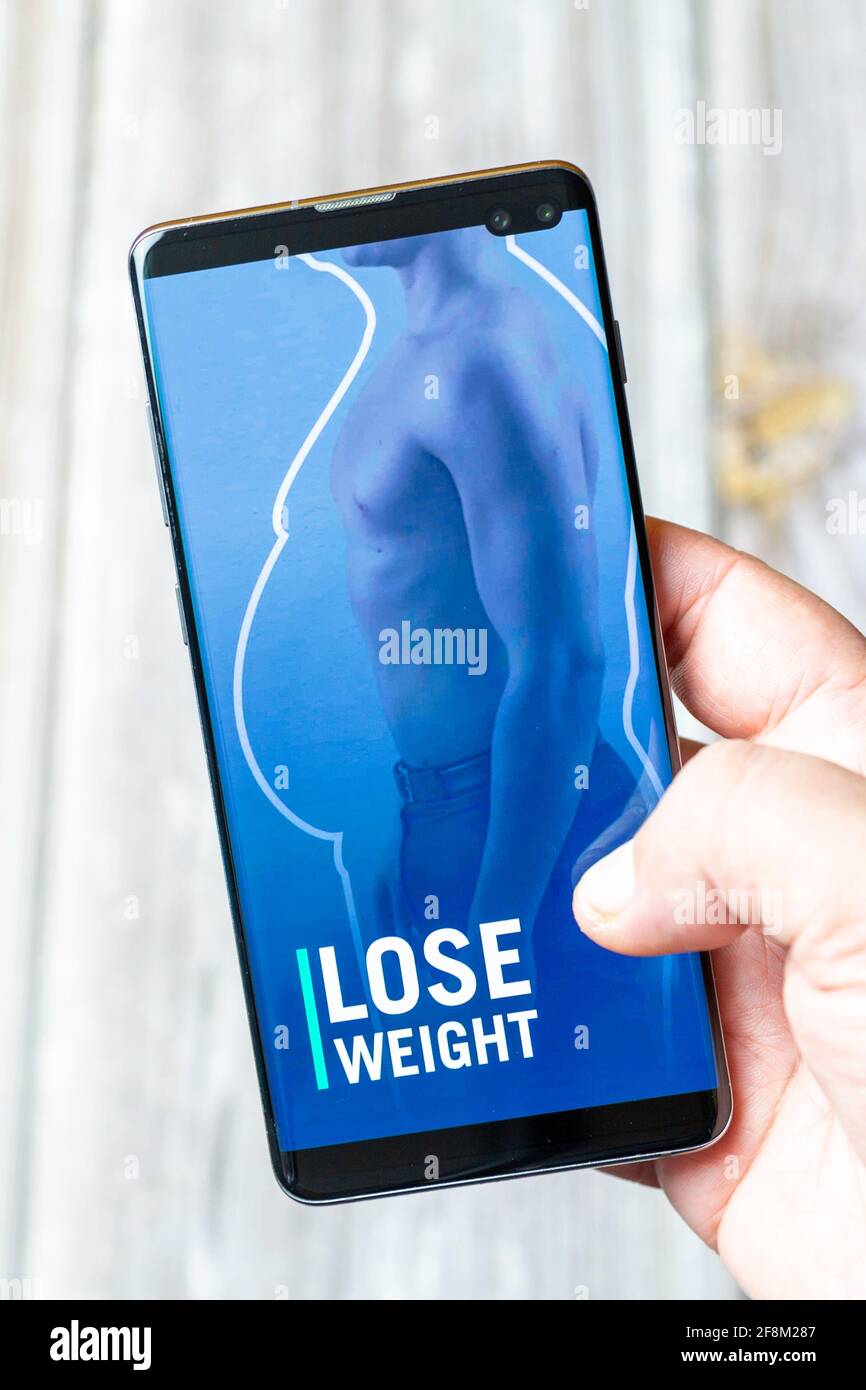 A Mobile phone or Cell phone being held in a hand showing the Lose ...