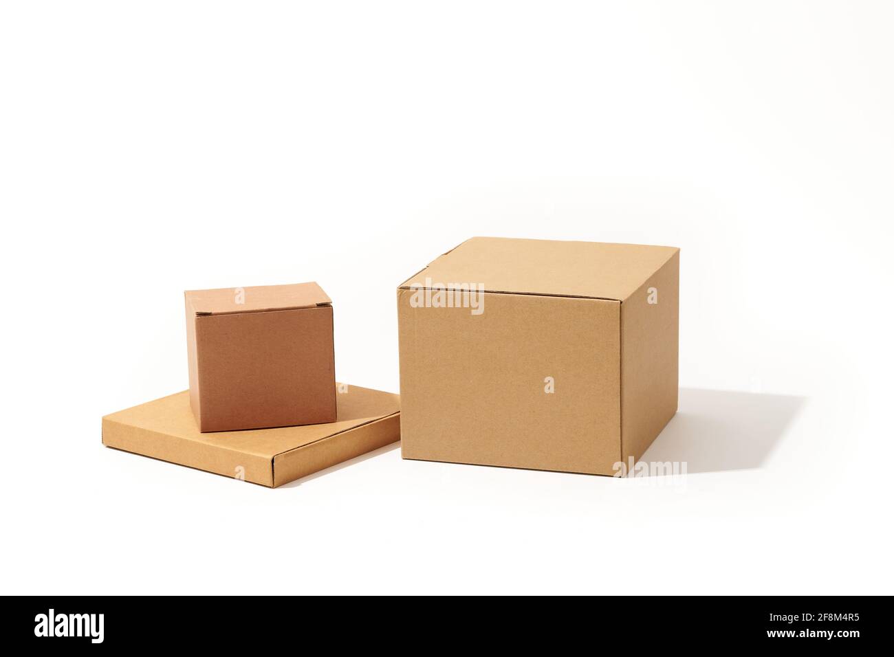 Different shaped cardboard boxes isolated on white background Stock ...