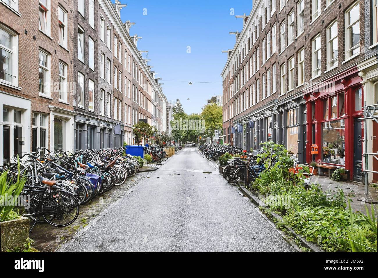 Narrow urban street with typical residential buildings Stock Photo - Alamy