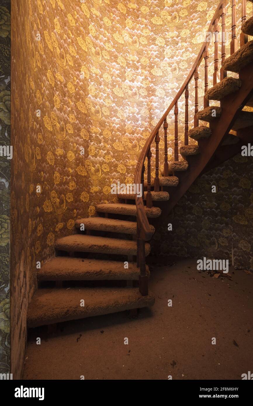 A semi circular staircase inside a house Stock Photo - Alamy