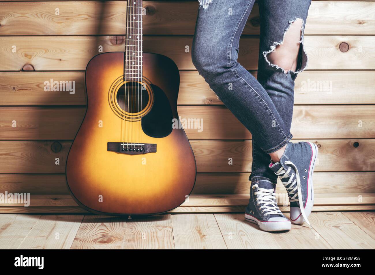 Female ripped jeans hi-res stock photography and images - Alamy