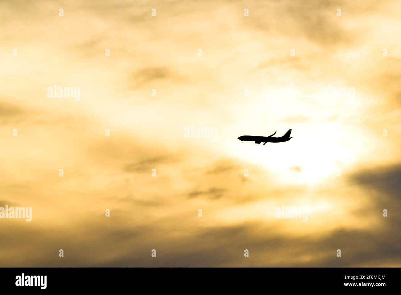 Flying into the sunset Stock Photo - Alamy