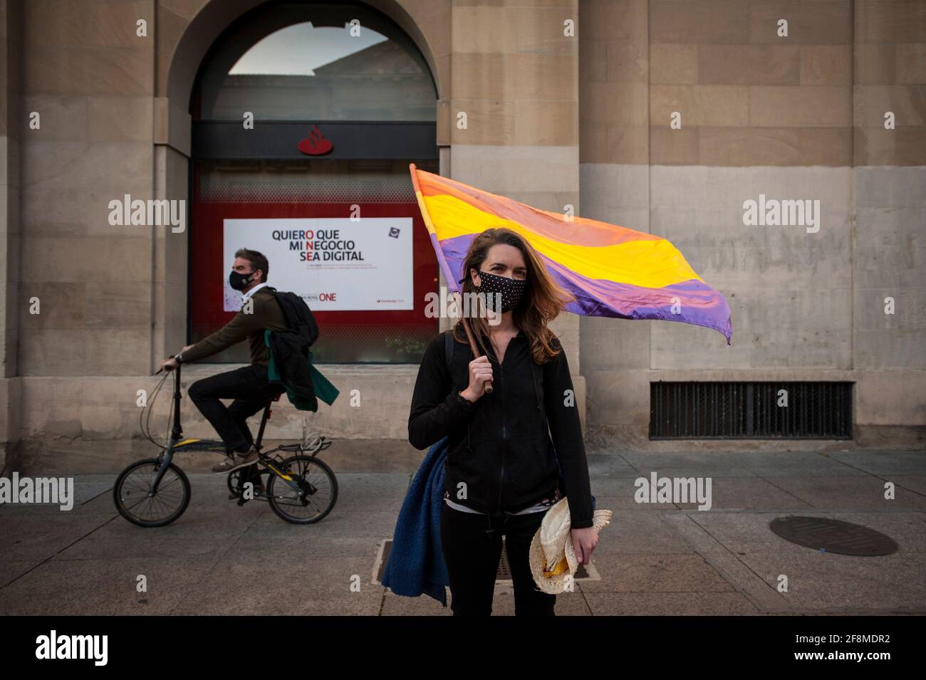 A protester holding a republican flag during the 90th anniversary ...