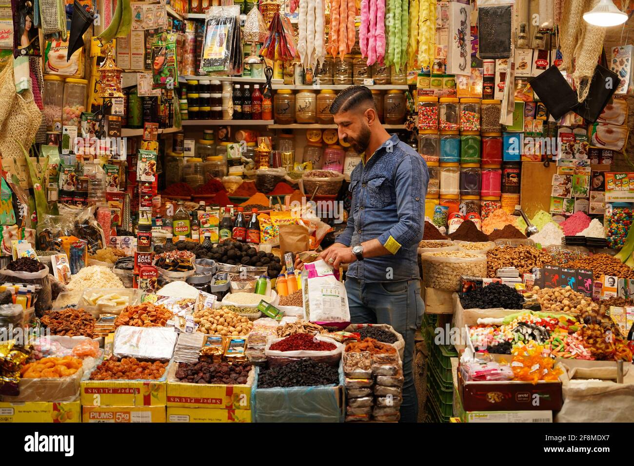 A spices seller seen in his shop in Bab Al-Saray market during the ...