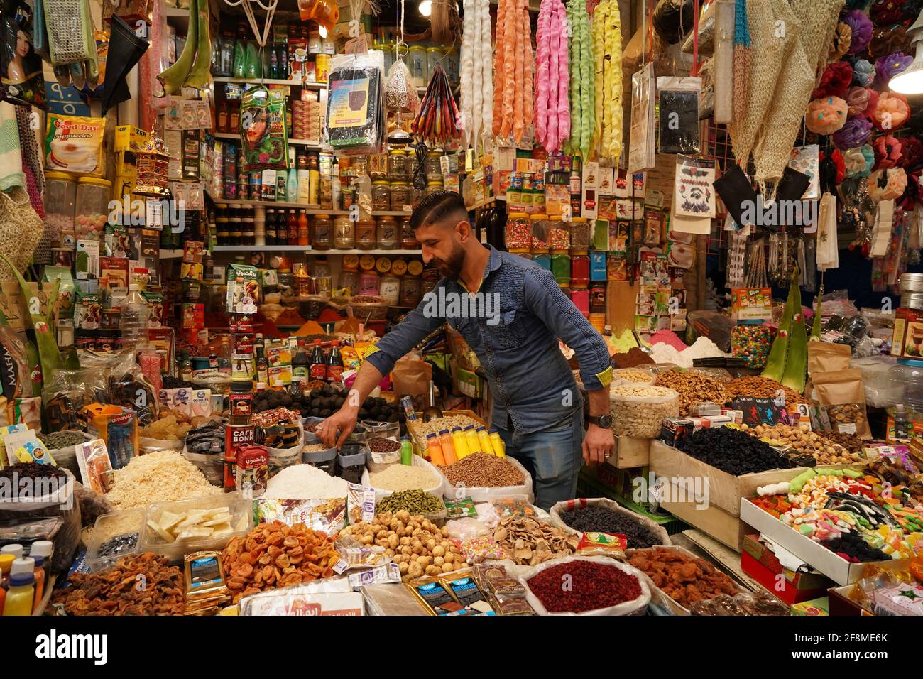 A spices seller seen in his shop in Bab Al-Saray market during the ...