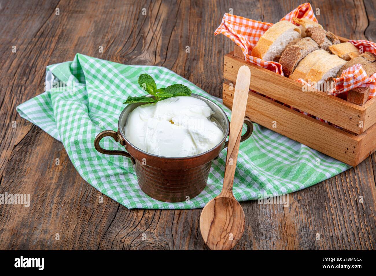 Water buffalo yogurt fermented in copper bowl. Homemade Yogurt in bowl ...