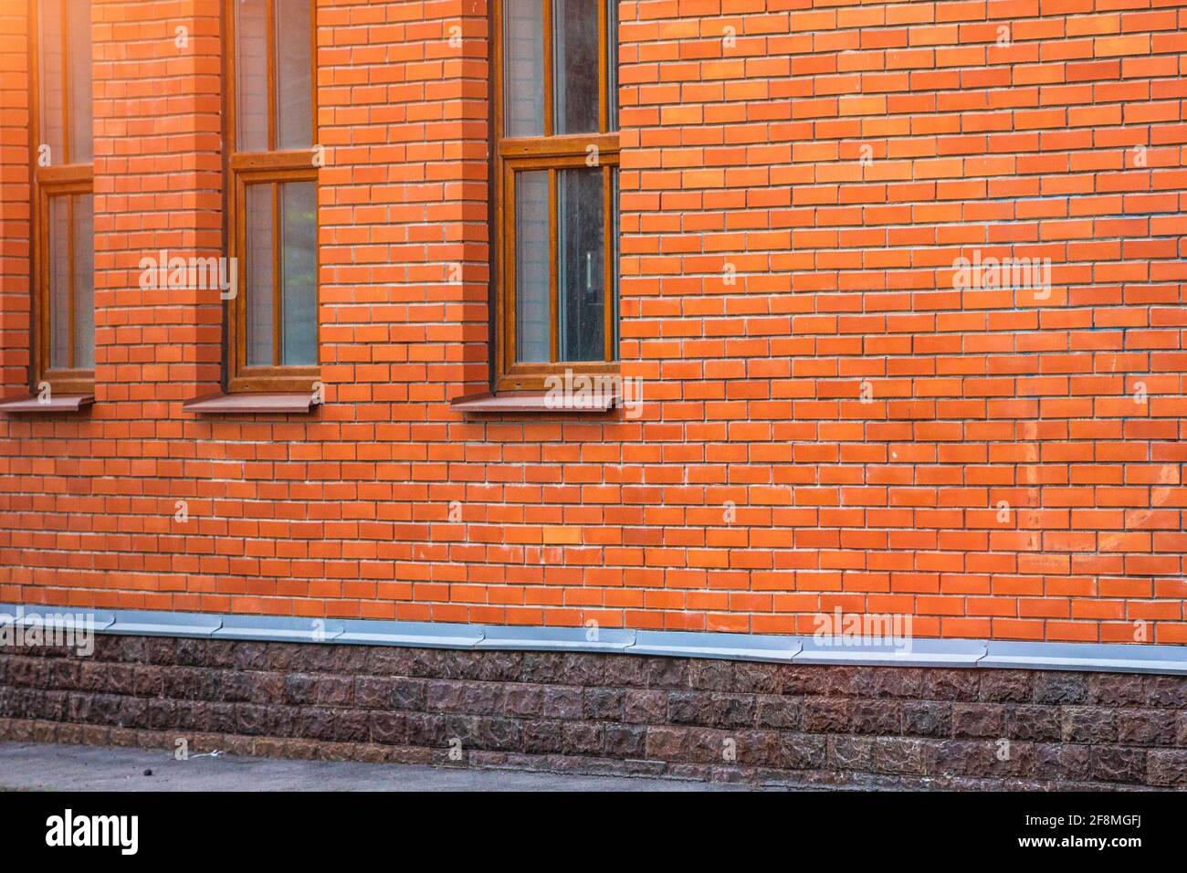 brickwork wall exterior finishing work lining the plinth Stock Photo ...