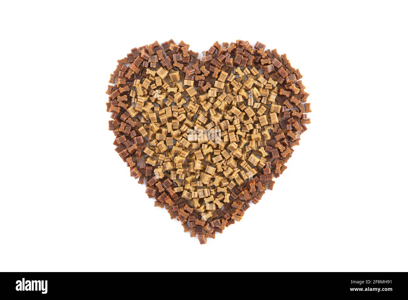 Dried animal pet dog food in heart form isolated on white background ...