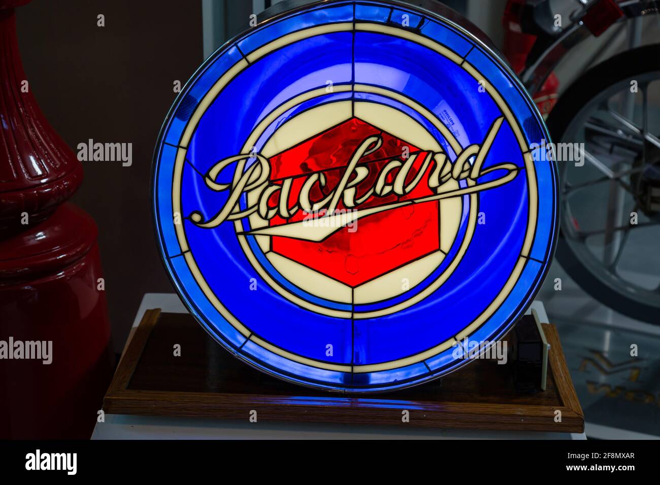 An illuminated stained glass Packard sign on display in the Elliott ...