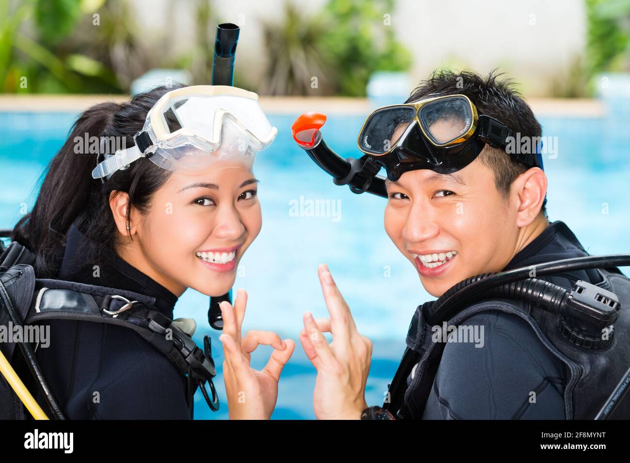 Asian people at the diver Course in diving school in wetsuit with an ...