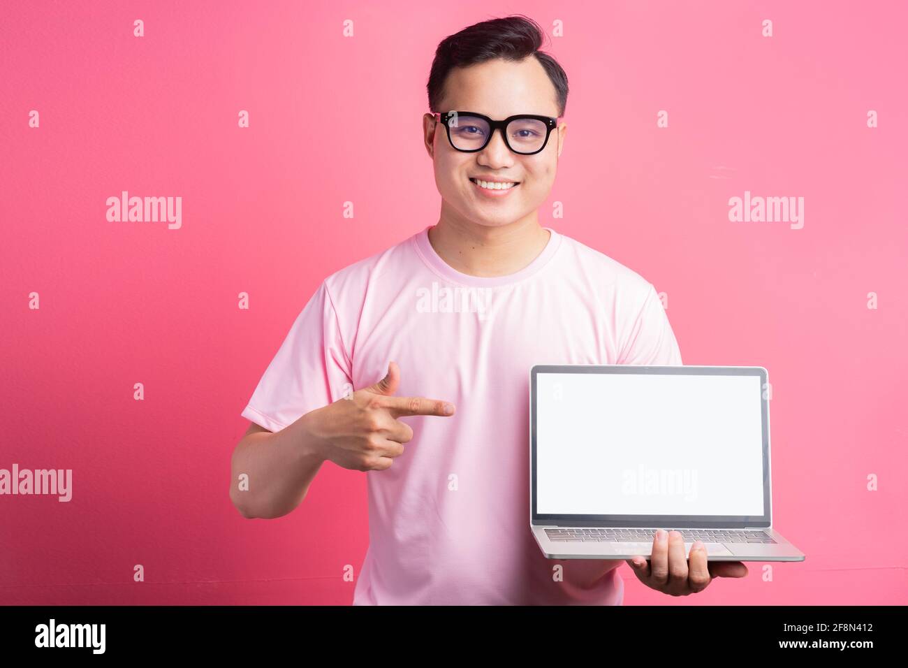 The Asian man was pointing at the computer screen Stock Photo - Alamy