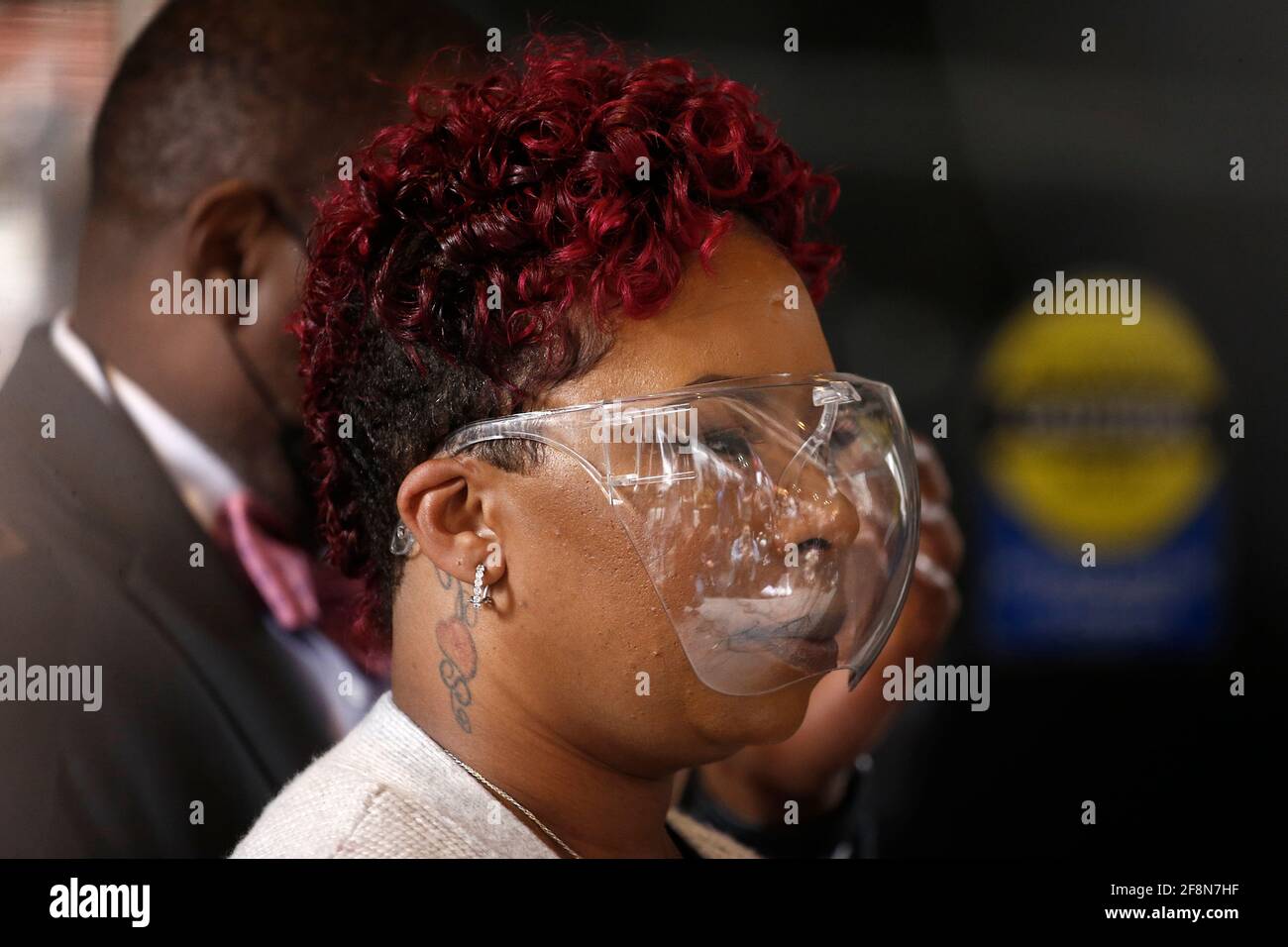 Lesley Mc Spadden listens as Reverend Al Sharpton and attorney Ben ...