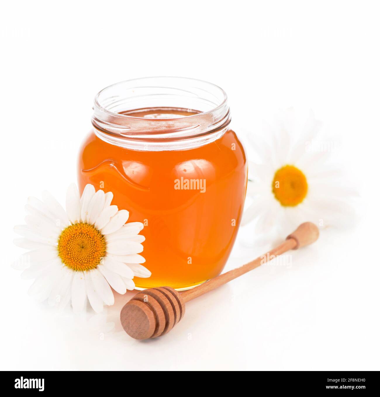 glass pot with floral honey isolated on white background Stock Photo ...