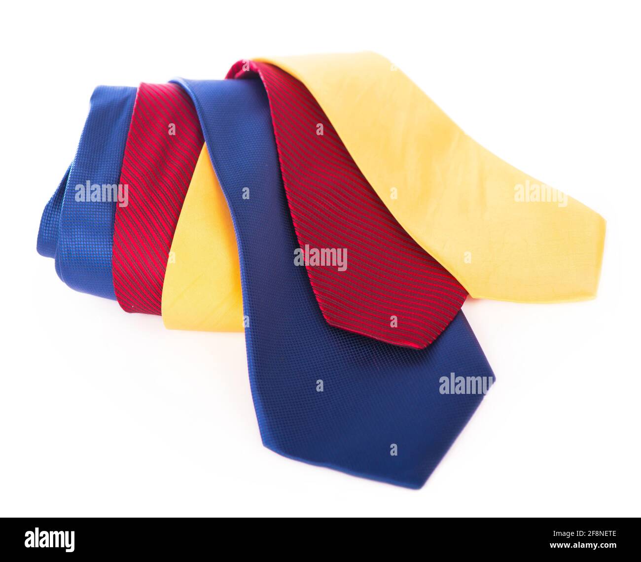 Red silk business tie rolled up over white background Stock Photo - Alamy