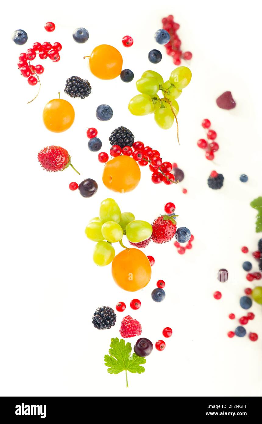berry mix isolated on a white background Stock Photo - Alamy