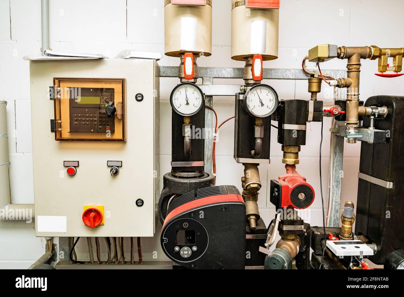 Technical room with devices for controlling the temperature of the ...