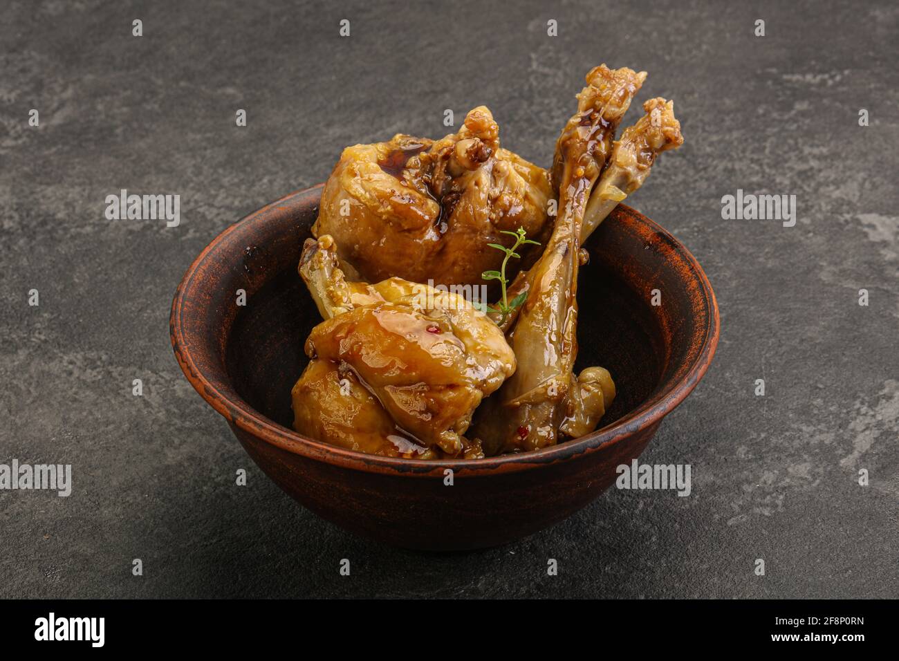 Rabbit stew in sweet and spicy sauce Stock Photo - Alamy