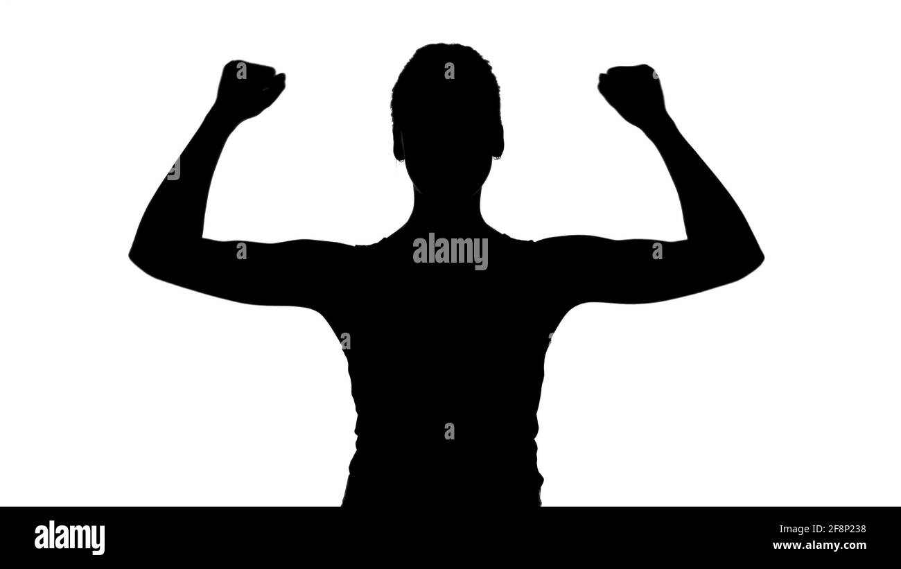 Woman's silhouette with hands up on white background Stock Photo - Alamy