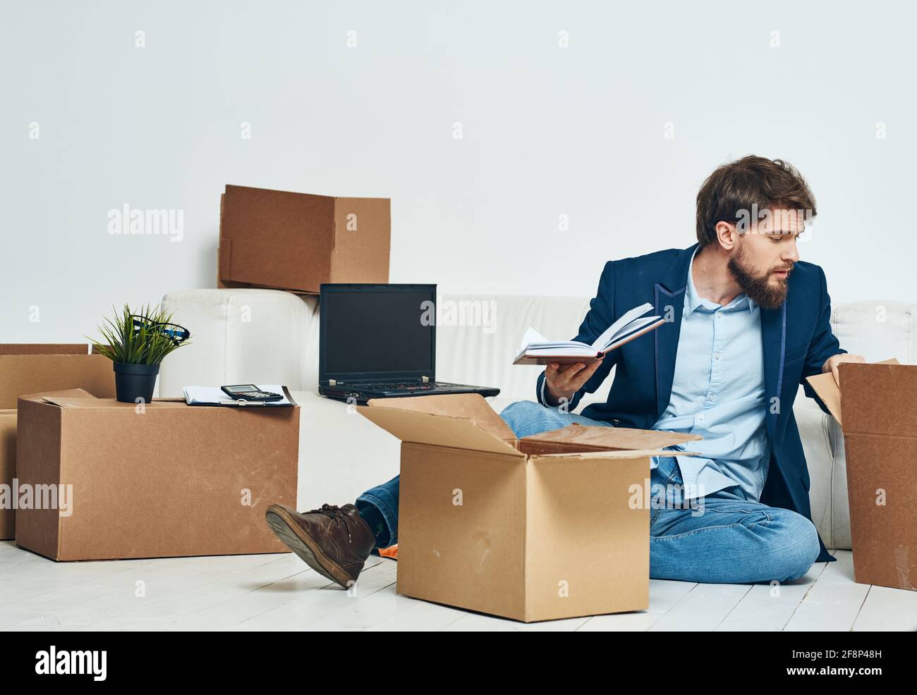 Business man boxes with new office things unpacking lifestyle Stock ...