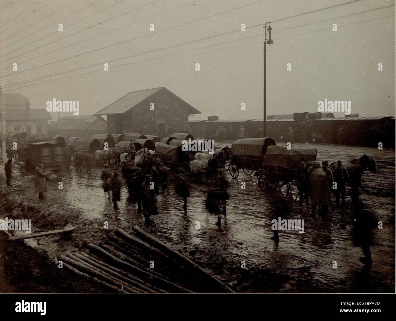 Bahnhofleben with streaming rain Stock Photo - Alamy