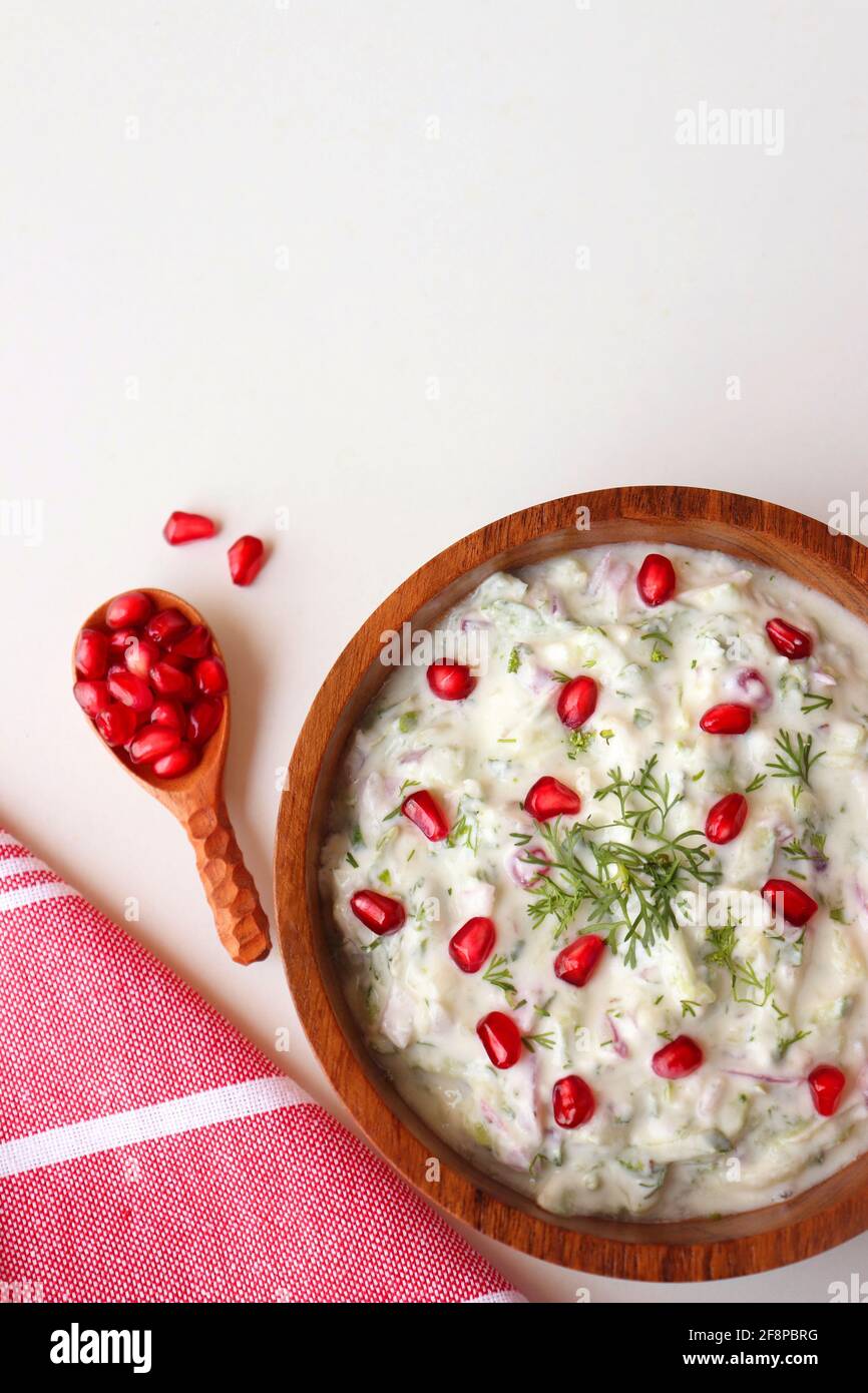 Pomegranate and Cucumber Raita. Indian Fresh sauce or condiment called ...