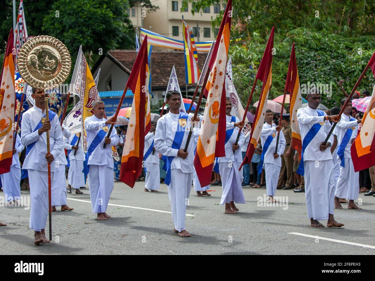 Flag Bearers perform during the Day Perahera, the final event of the ...