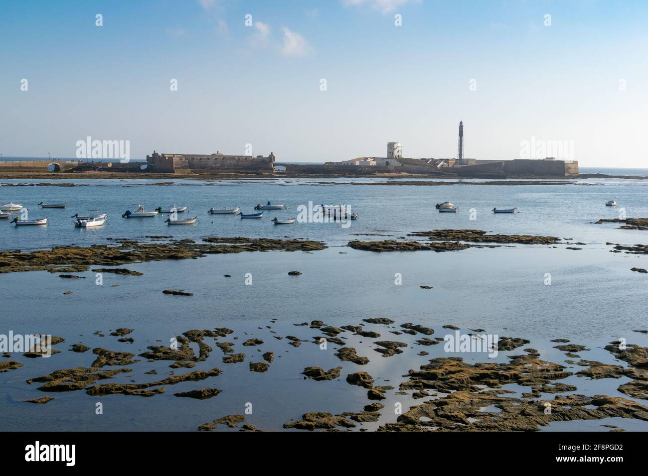 Landscape of La Caleta surrounded by the sea under the sunlight in ...
