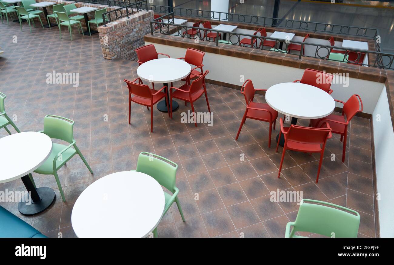 View on food court zone near by the ice rink in modern shopping mall ...