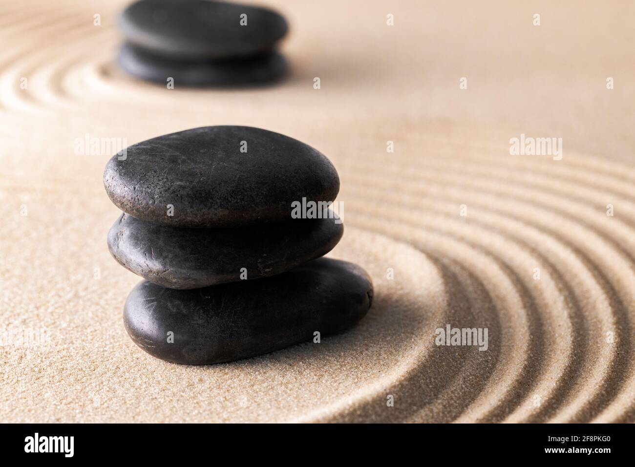 Japanese zen garden with stone in raked sand Stock Photo - Alamy