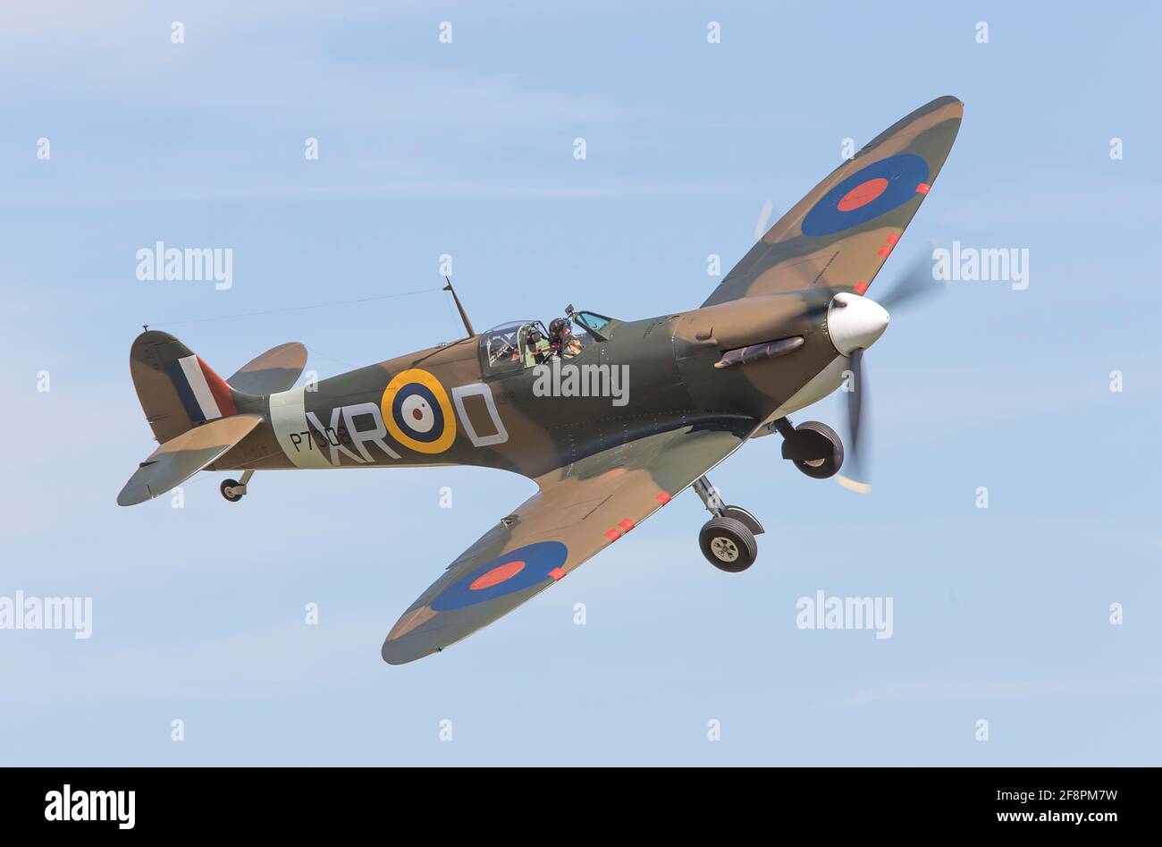 Spitfire Mk1 landing after display at Duxford Stock Photo - Alamy