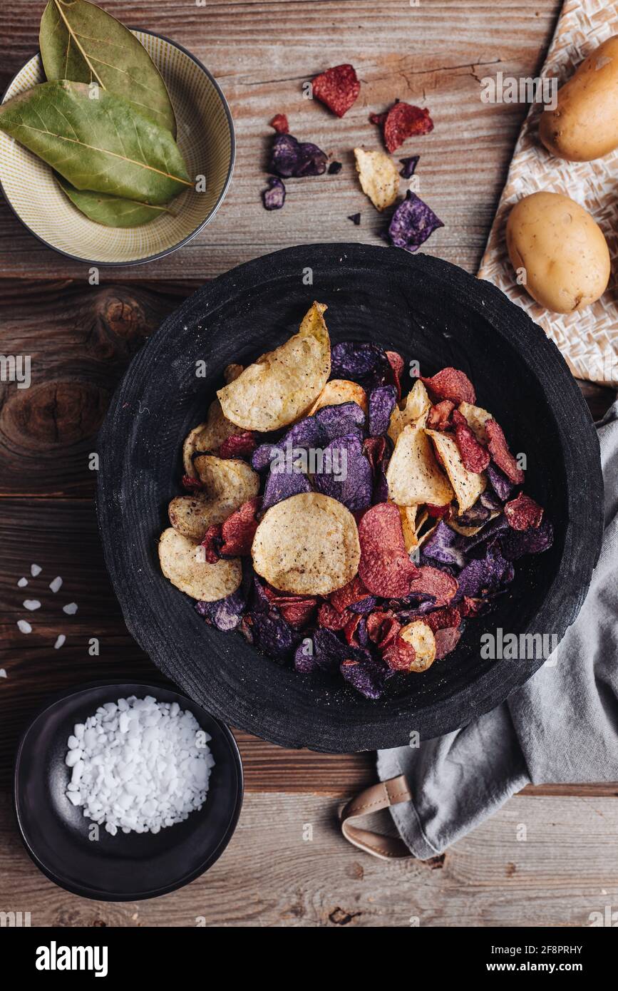Crispy potato chips in various colors Stock Photo - Alamy