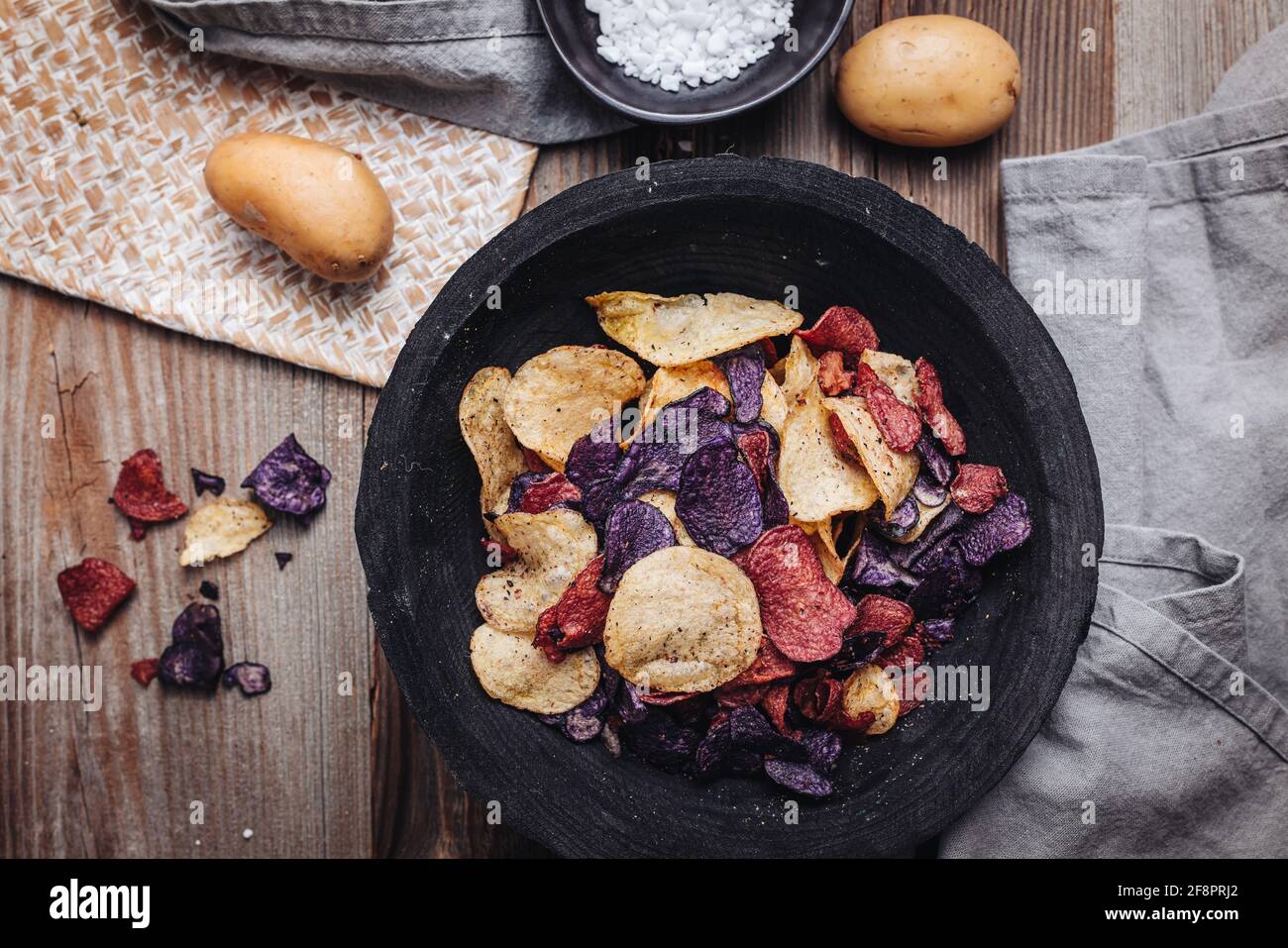 Crispy potato chips in various colors Stock Photo - Alamy