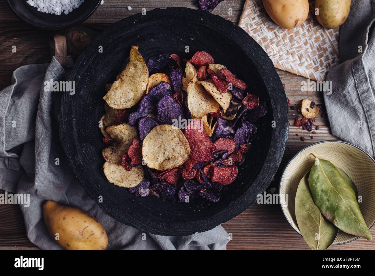 Crispy potato chips in various colors Stock Photo - Alamy