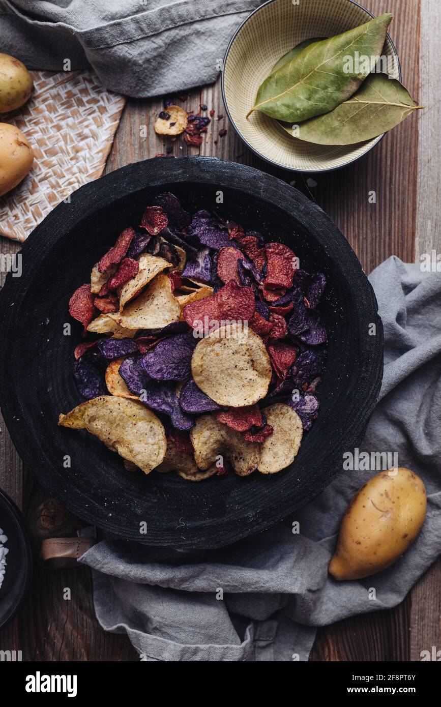 Crispy potato chips in various colors Stock Photo - Alamy