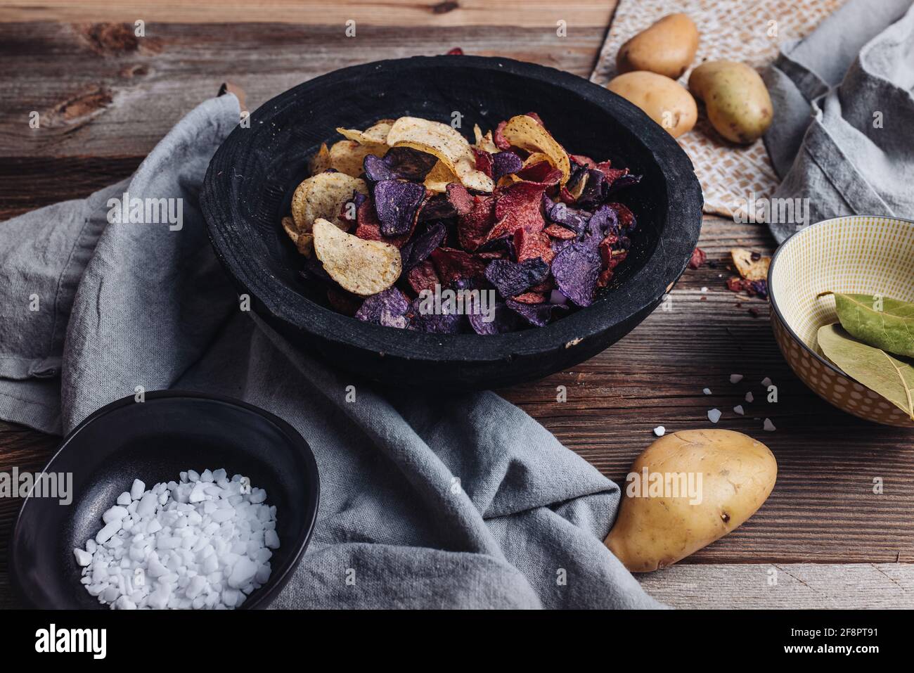 Crispy potato chips in various colors Stock Photo - Alamy