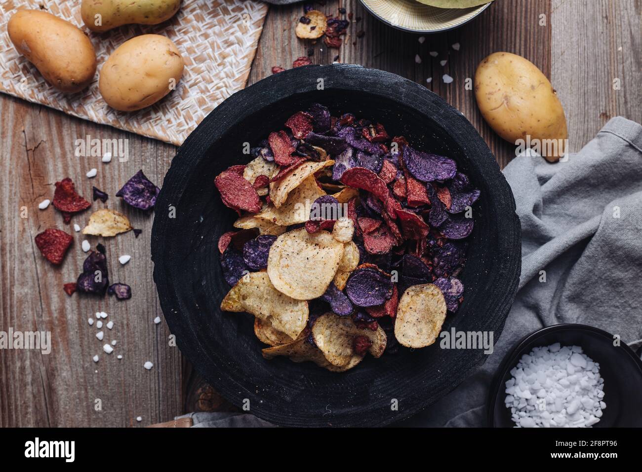 Crispy potato chips in various colors Stock Photo - Alamy
