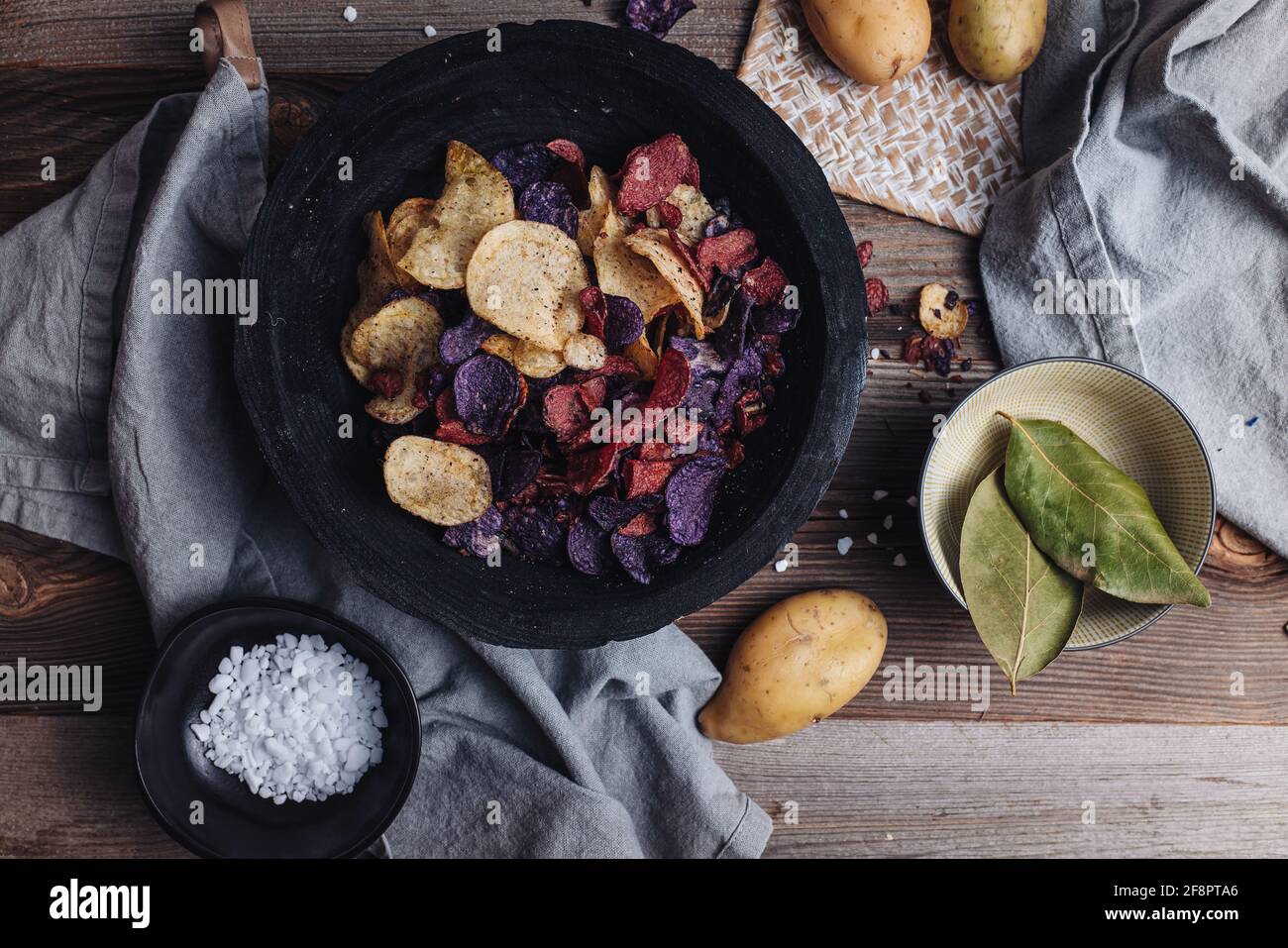 Crispy potato chips in various colors Stock Photo - Alamy