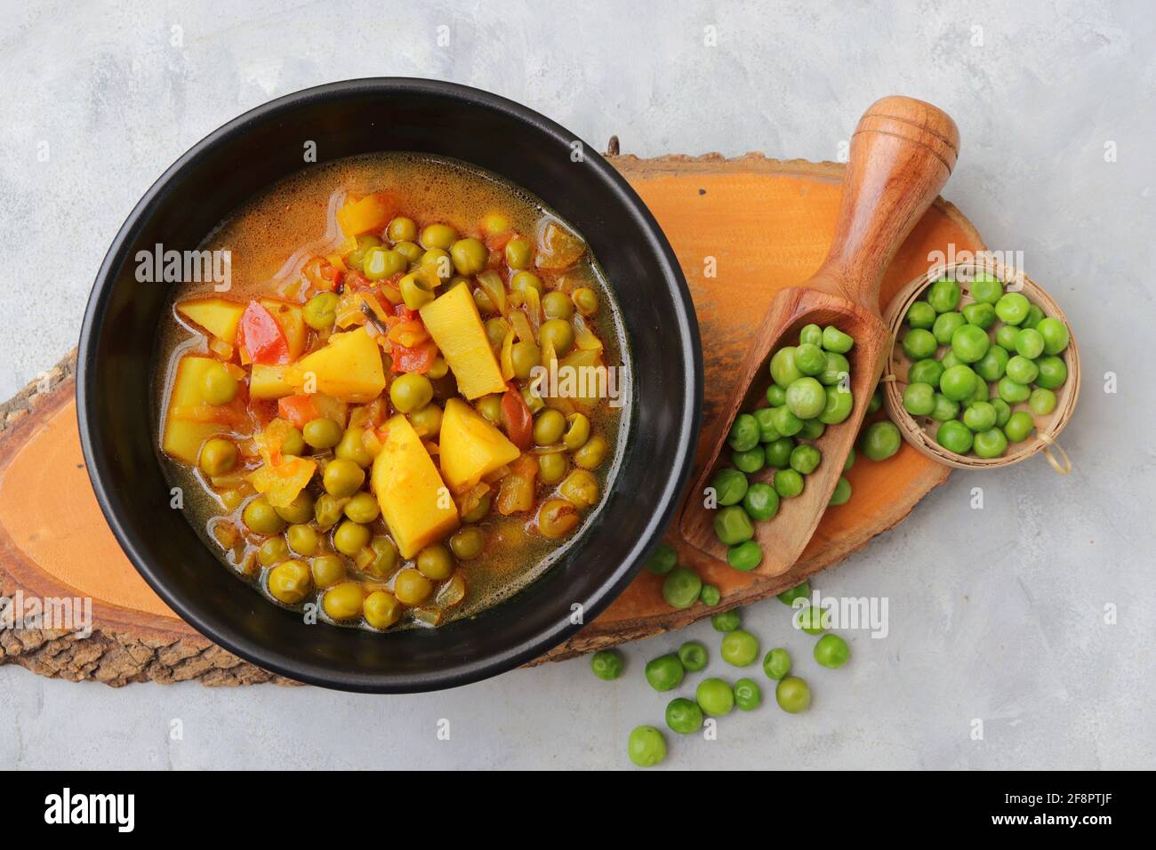 Indian popular homemade Aloo Matar. Potatoes and peas curry. Vatana ...
