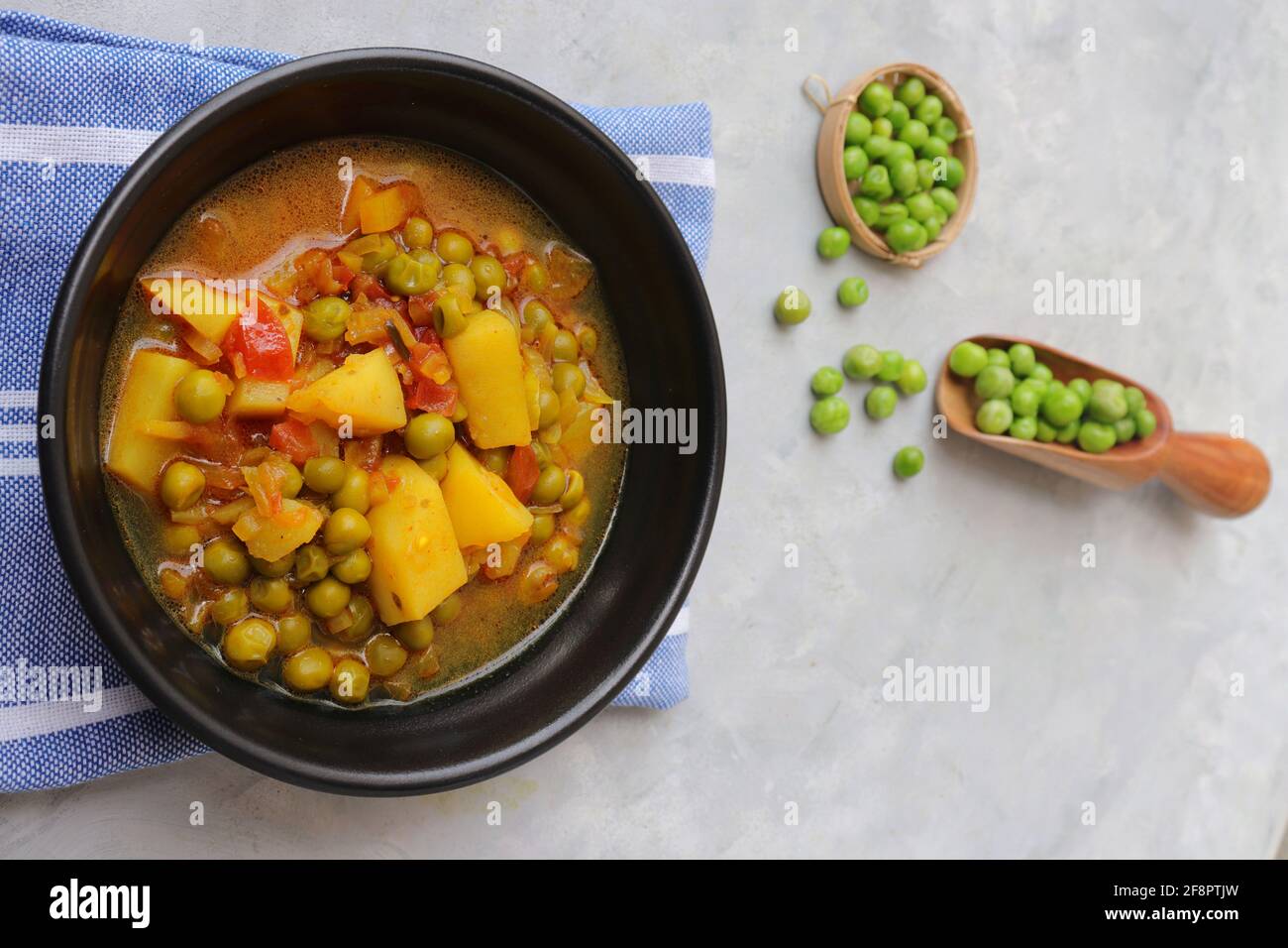 Indian popular homemade Aloo Matar. Potatoes and peas curry. Vatana ...