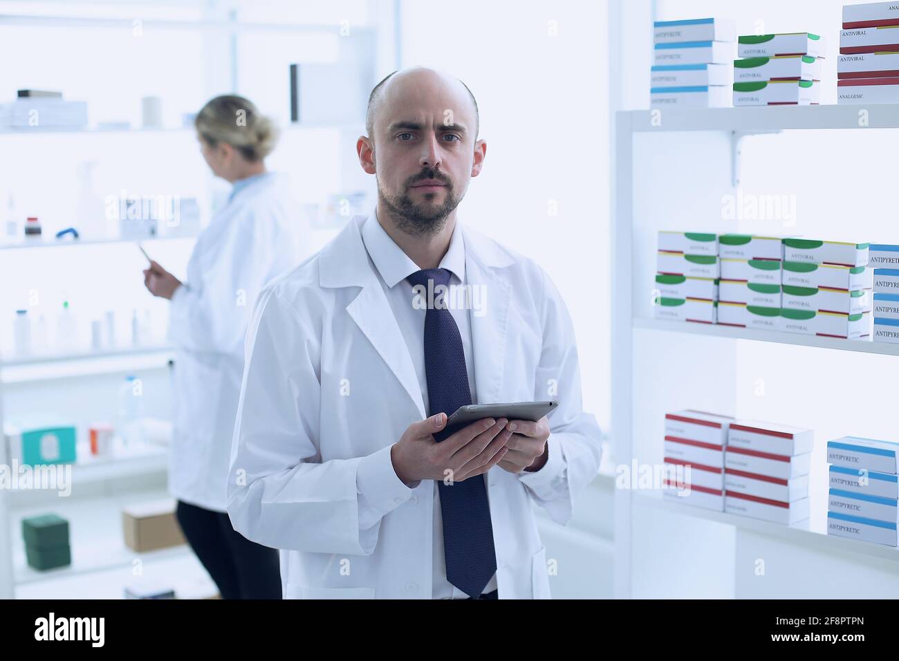 Pharmacists is Working. Man and Woman. People Wearing Special Medical ...