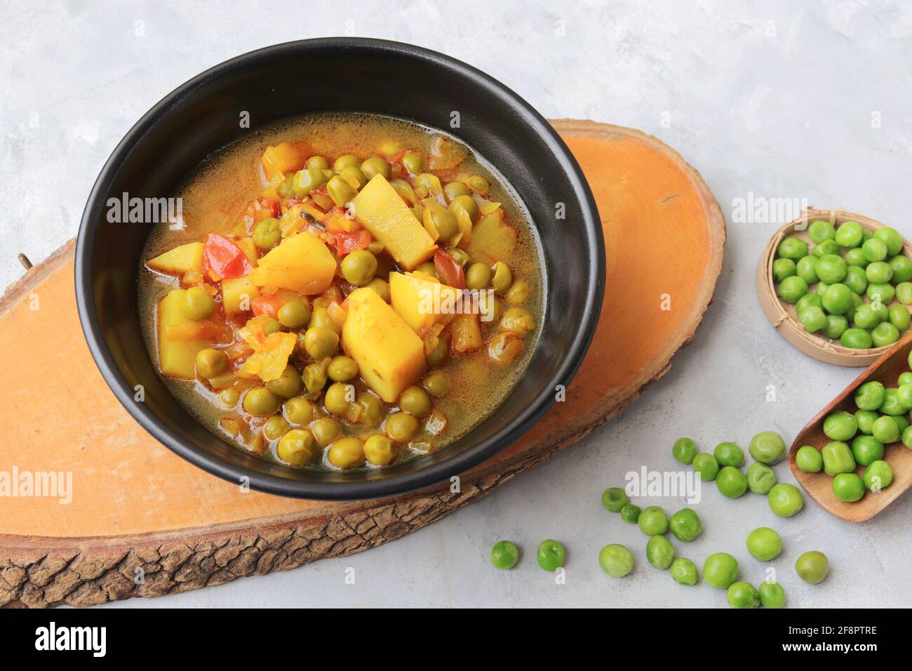 Indian popular homemade Aloo Matar. Potatoes and peas curry. Vatana ...