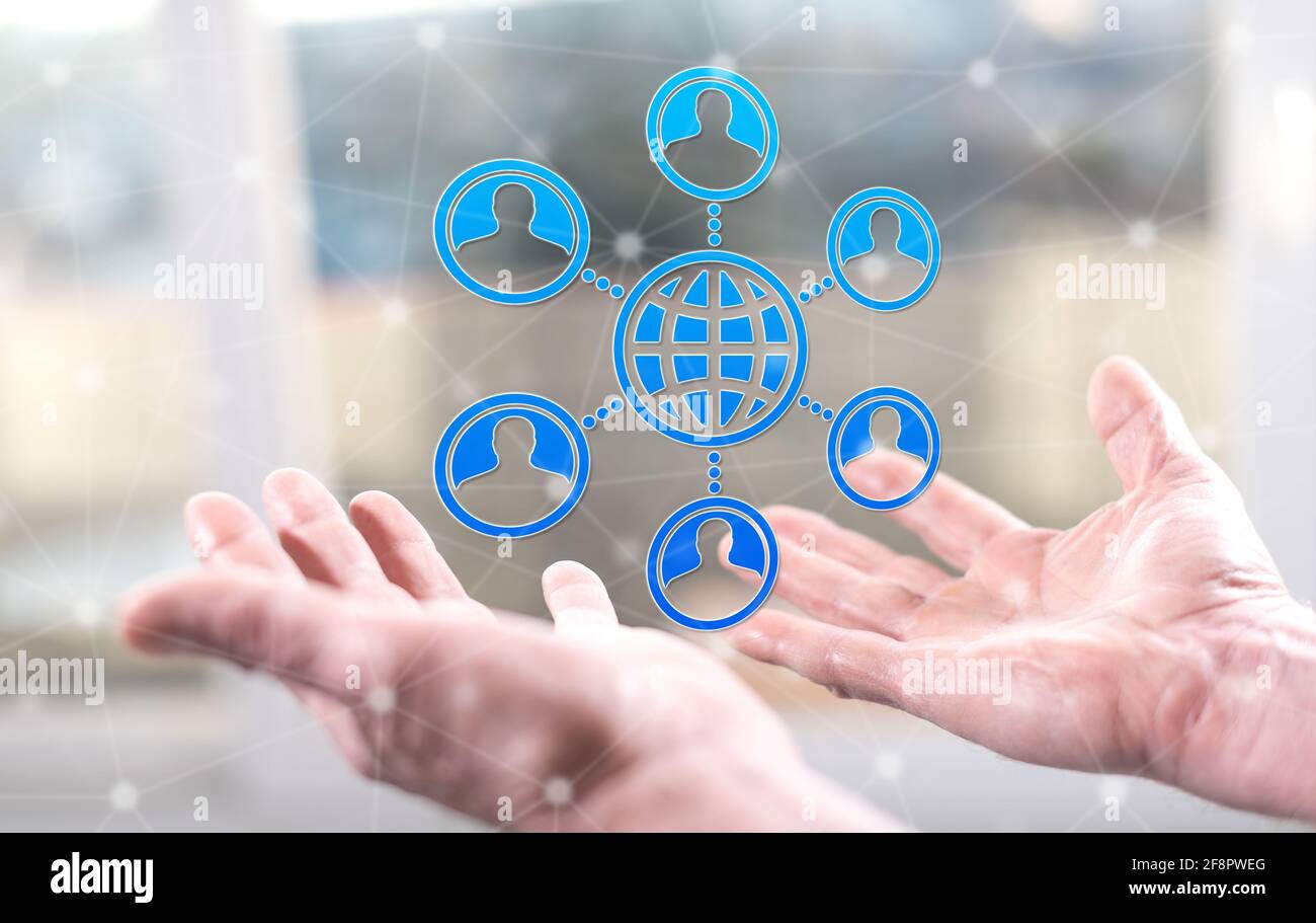 Globalization concept above the hands of a man Stock Photo - Alamy