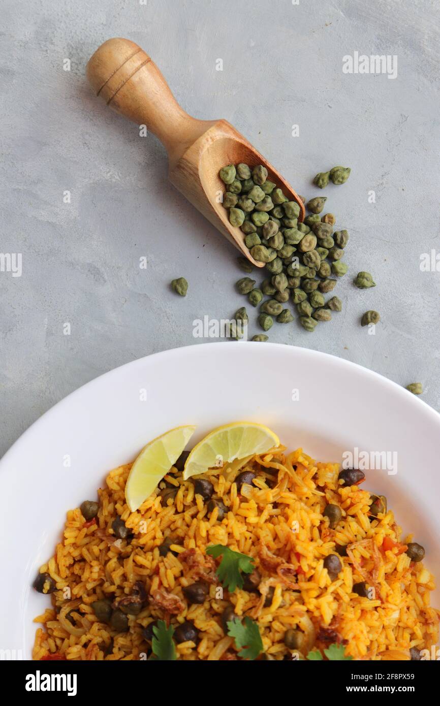 Indian cuisine - Chickpeas Biryani, chole Pulao. Garnished with fried ...