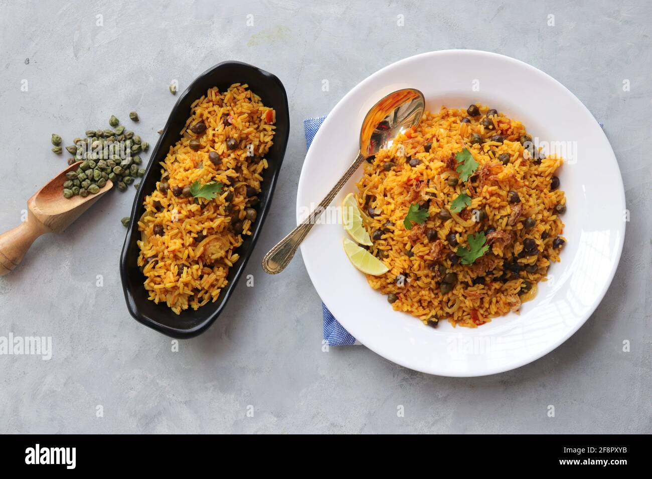 Indian cuisine - Chickpeas Biryani, chole Pulao. Garnished with fried ...