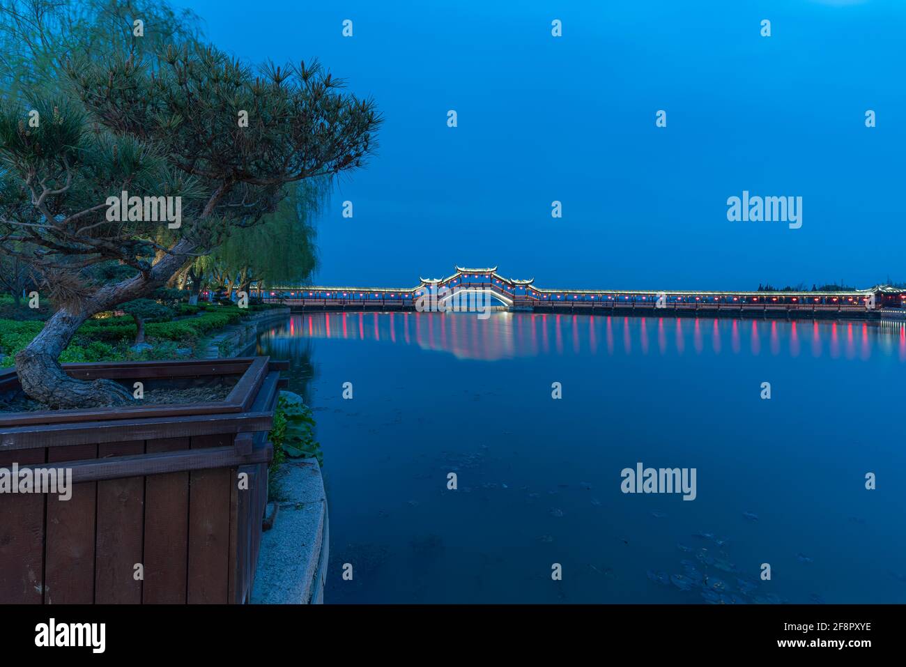 Landscapes of the ancient buildings in Jinxi at night, a historic canal ...